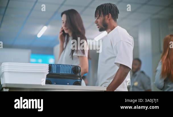 Security Checkpoint in International Airport Terminal: Multiethnic ...