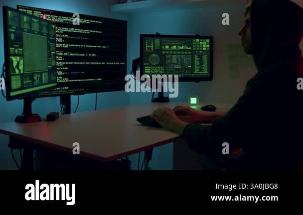 A mysterious hacker surrounded by digital code attempts to bypass a ...