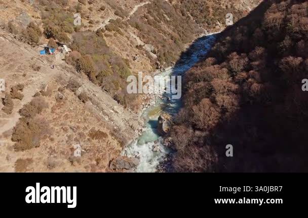 Aerial view revealing Mount Everests snow capped summit overlooking ...