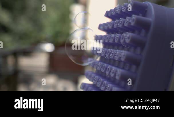 Single bubble forming on a bubble machine nozzle in slow motion at 800 ...