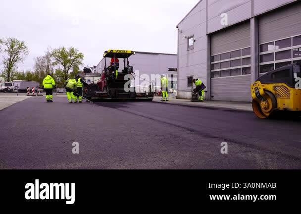 Asphalt Paving Machine, Road Roller and Workers Working. Asphalt ...