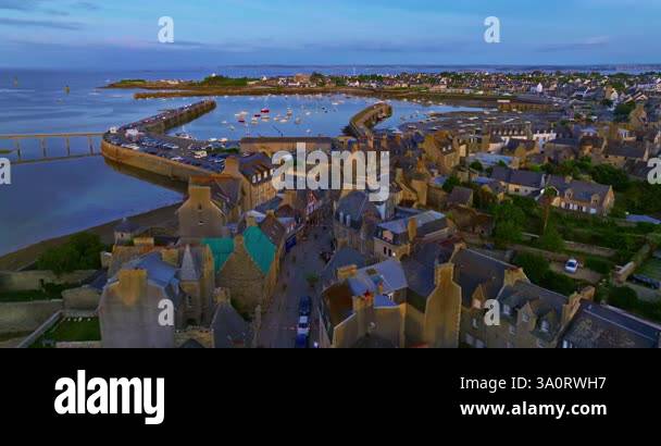 Aerial view of Roscoff cityscape, with Roscoff jetty in the background ...