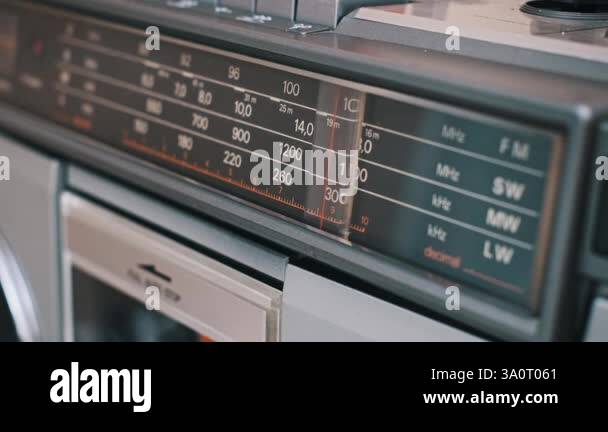 Close-up view of tuning dial on a classic audio player, showing radio ...