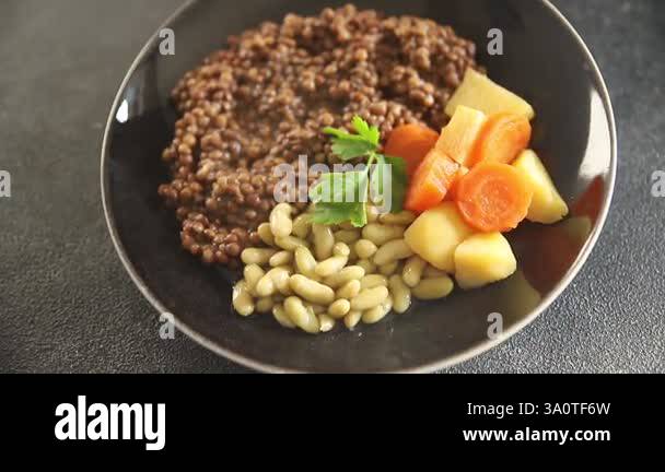 Vegetarian main course vegetables lentils, beans, potatoes, carrots ...