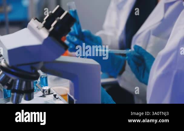 laboratory research. scientist working in laboratory with test tubes ...