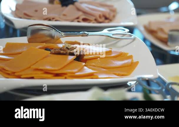 Various types of cheese and deli meats displayed appealingly on ...