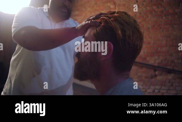 Man receiving prayer support, individual with head lowered, intense ...