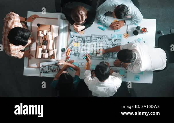 Top aerial view of project manager or civil engineer writing at ...