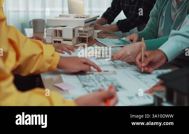 A vibrant scene showcasing a dynamic architecture team collaborating ...