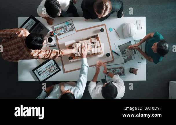 Top view of smart manager clapping hands and putting hands together to ...