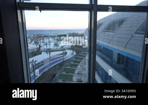 video captures an elevator moving down, revealing a luxurious hotel ...