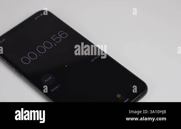 The stopwatch is running on the mobile phone screen Stock Video Footage ...