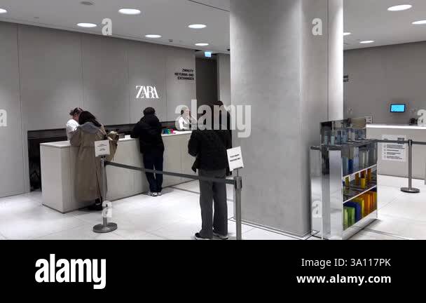 Warsaw, Poland - May 01, 2024: Fashionable customers wait patiently in ...