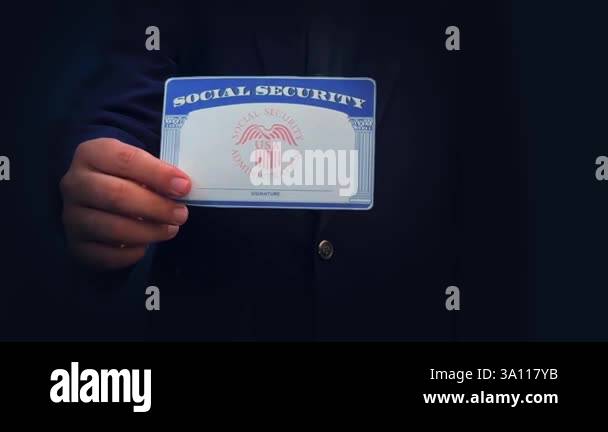 A man showing Social Security Card 4K Footage front view. Social ...
