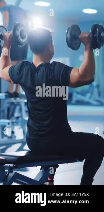 Sportsman bodybuilder trainer working out weightlifting heavy black ...