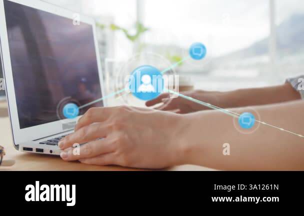 Hands typing on laptop with digital network connections overlay ...
