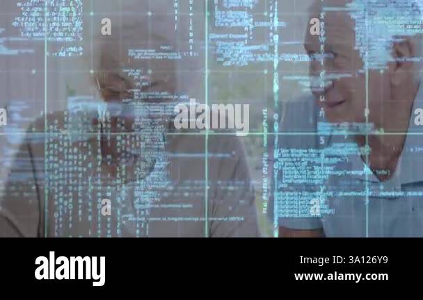 People working at desk with programming code and data processing ...