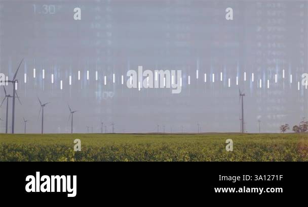 Wind turbines spinning in field with data processing animation overlay ...
