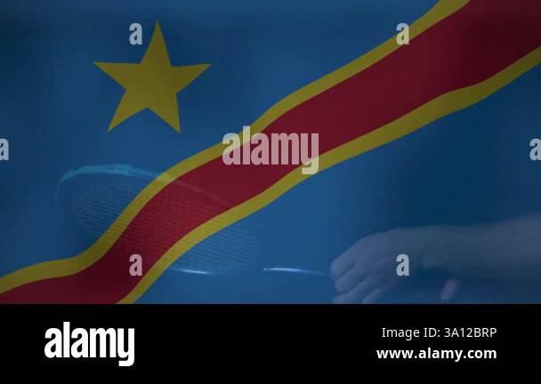 Hands with Democratic Republic of Congo flag and digital grid pattern ...