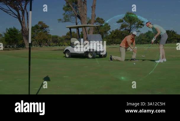 Golfers putting on green with digital data animation over golf course ...