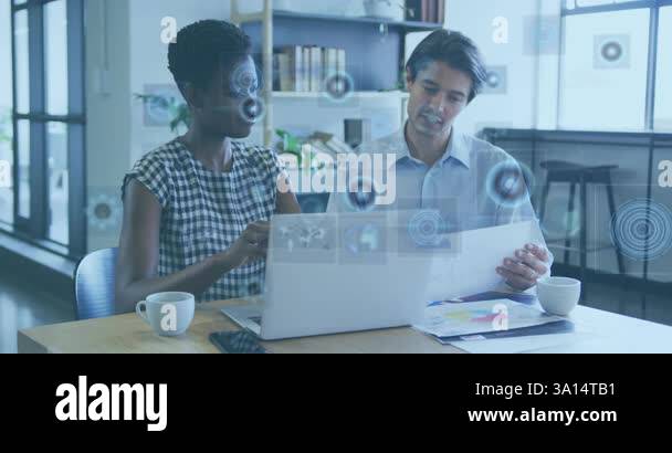 In office, business professionals interacting with animation on digital ...