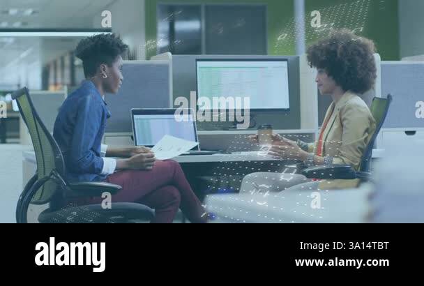 Two people discussing in office with binary code animation overlay. Technology, business ...