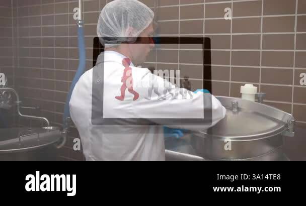 Man in lab coat working with machinery, animation of figures overlaid ...