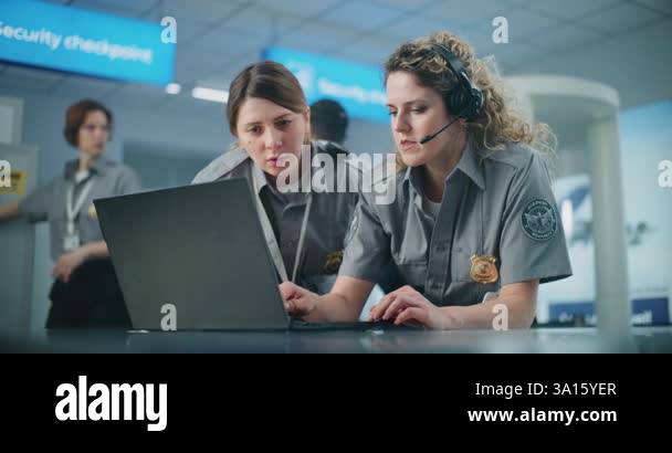 Airport Security Checkpoint: Female Security Officer Wearing Headset ...