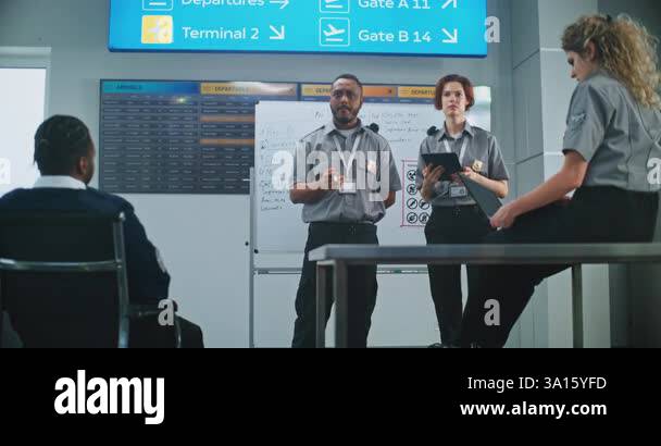 Airport Security Staff Briefing: Professional African American TSA ...