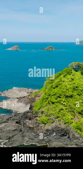 Drone view of small islands near Nacpan Beach. Bolog Islands and Bury ...