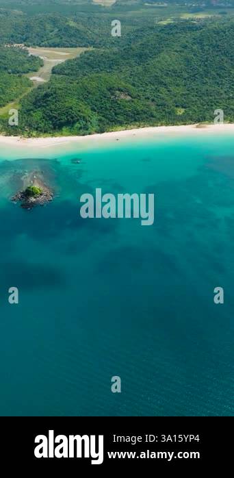 Nacpan Beach with sandy beach and blue sea. El Nido, Palawan ...