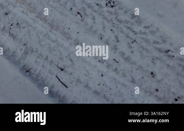 tire tracks on snow. tire tread marks on ground. winter tires. winter ...