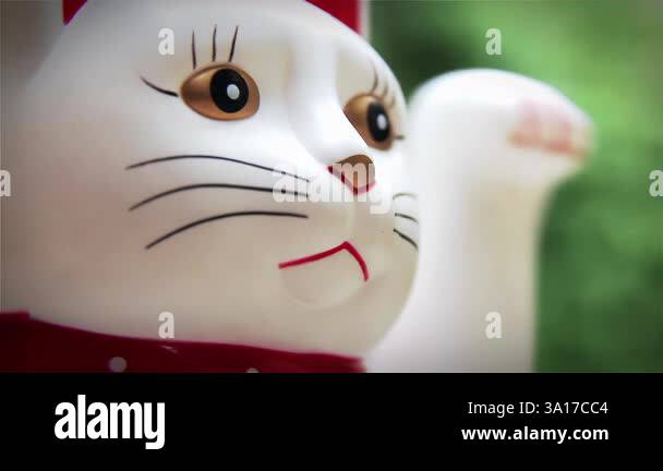 Japanese Lucky Cat, Maneki-neko, waving its Paw. Close Up. 4K Resolution Stock Video Footage - Alamy