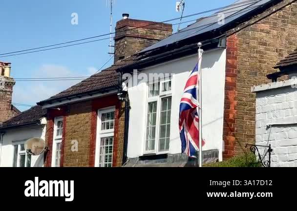 Charming traditional English terraced houses with brickwork and white ...