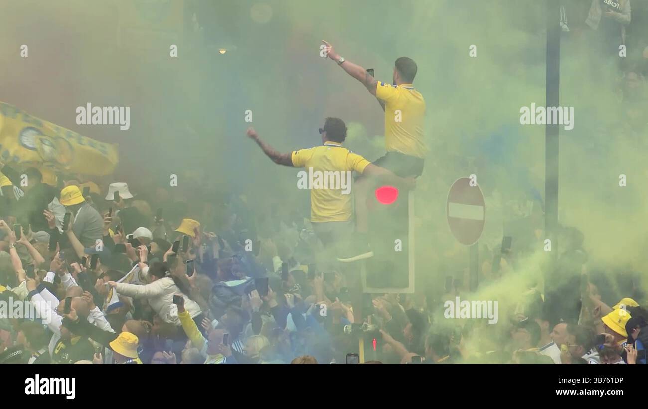 Leeds United fans line the street as parade buses enter city centre ...