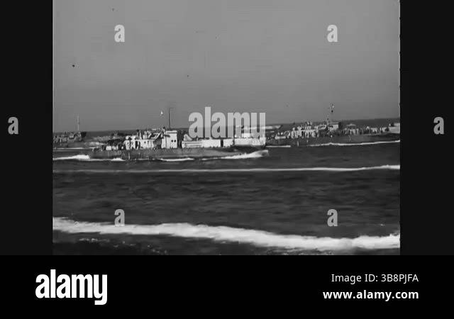 FRANCE - 1944 - US soldiers walk off LCI's onto beach and head inland ...