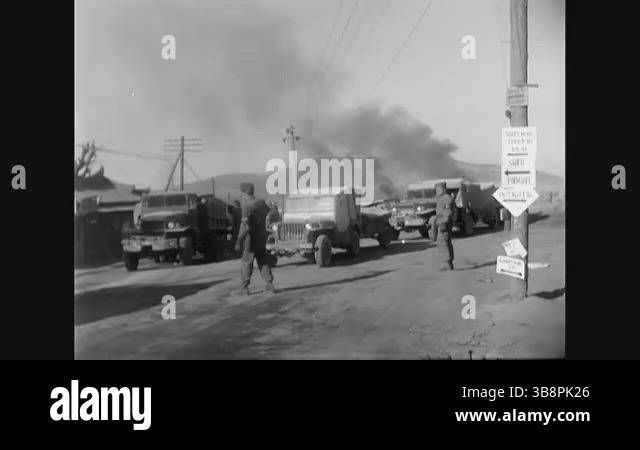 PYONGYANG - 1950 - Military traffic stalls as two roads converge into a ...