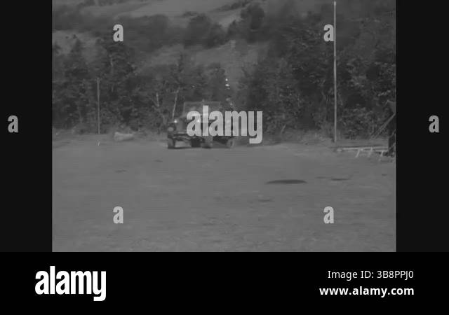 UNITED STATES - 1944 - US soldier drives DUKW loaded with cargo during ...
