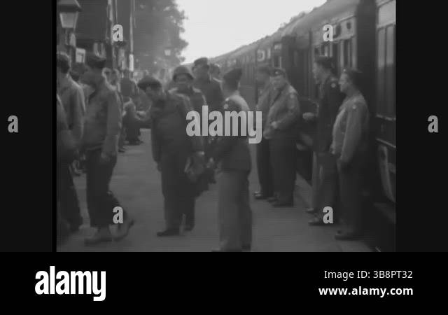 ENGLAND - 1944 - Wounded soldiers move from train to ambulance trucks ...