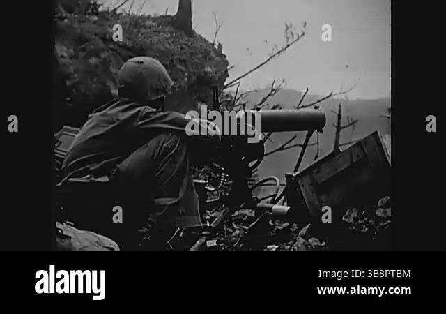 JAPAN - 1945 - US marines fire machine guns in the Battle of Okinawa ...