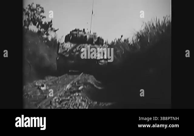 OKINAWA - 1945 - Marines walk behind tanks in Okinawa, Japan Stock ...