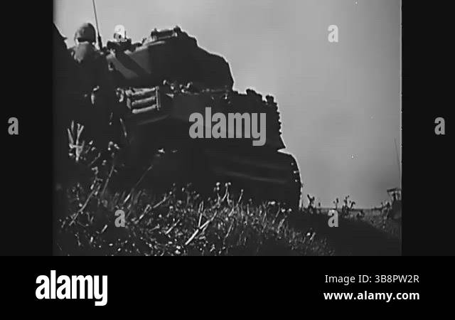 OKINAWA - 1945 - Marines walk behind tanks in Okinawa, Japan Stock ...
