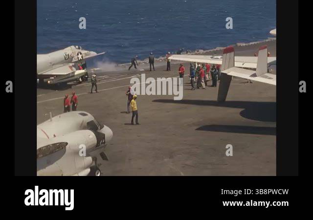 MEDITERRANEAN SEA - 1968 - Engineers and officers work diligently on ...