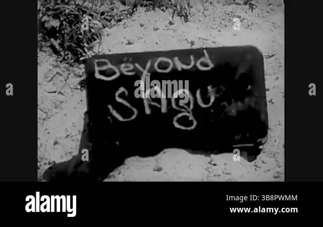 OKINAWA - 1945 - Marines stand in a large trench roadblock in Okinawa ...