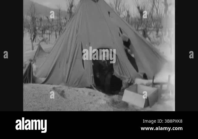 ITALY - 1944 - Soldiers walk out of burned tent, and volcanic dust ...