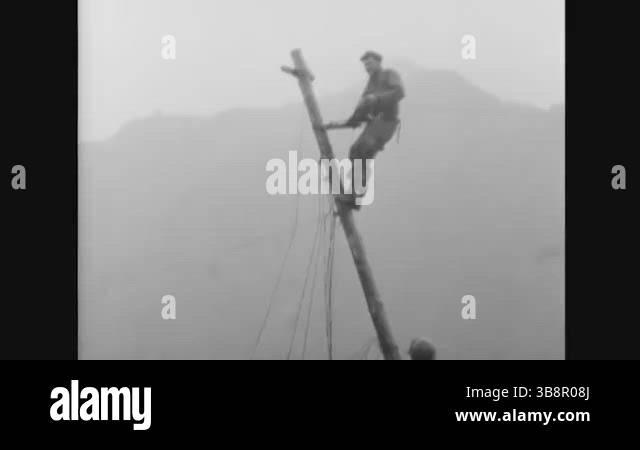 KOREA - 1951 - US lineman works on a pole in Korea during the Korean ...