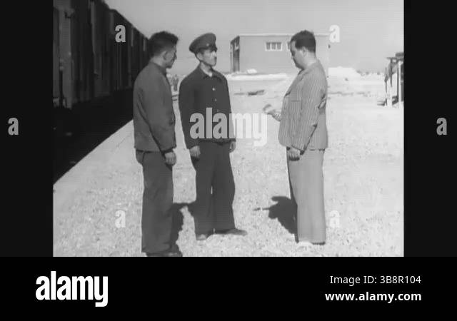 IRAN - 1944 - Train station personnel checks clearance in Iran during ...