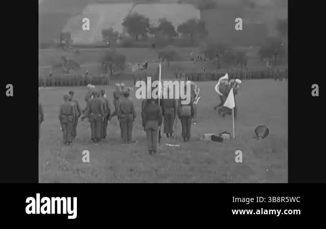 GERMANY - 1945 - Troops march in parade for a military award ceremony ...