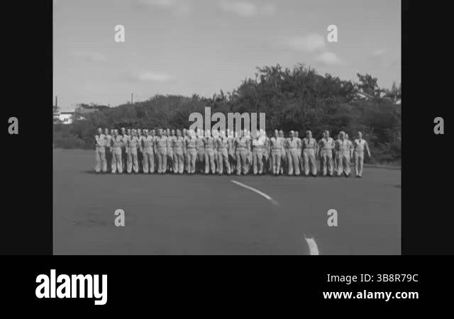 OAHU - 1951 - Troops stand in line at a graduation ceremony at Hunter ...
