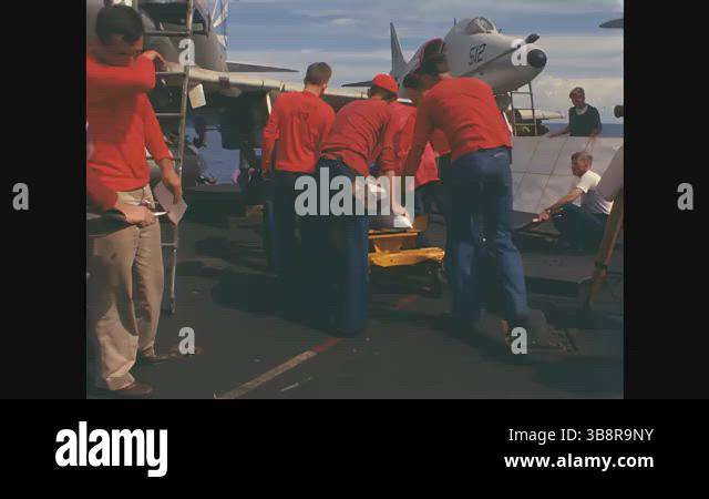 VIETNAM - 1965 - The BULLPUP missile is loaded and latched securely to ...